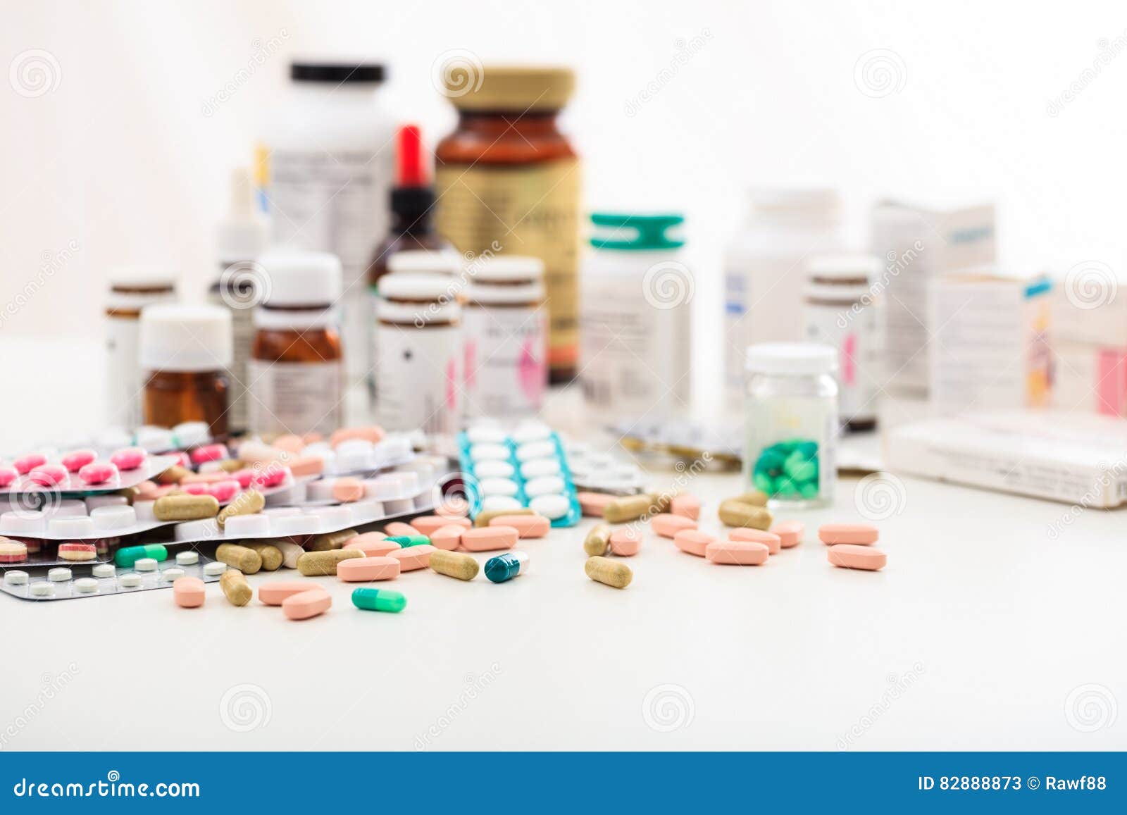 Stack of Pills and Containers on White Background Stock Image - Image ...