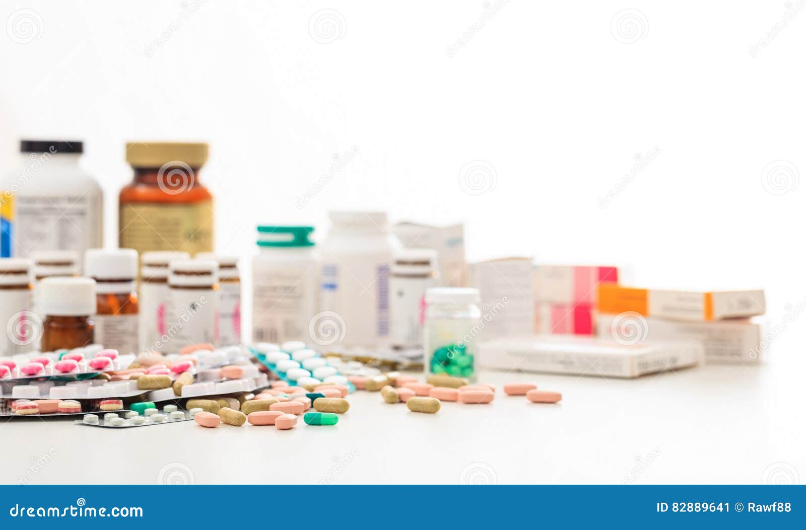 Stack of Pills and Containers on White Background Stock Image - Image ...