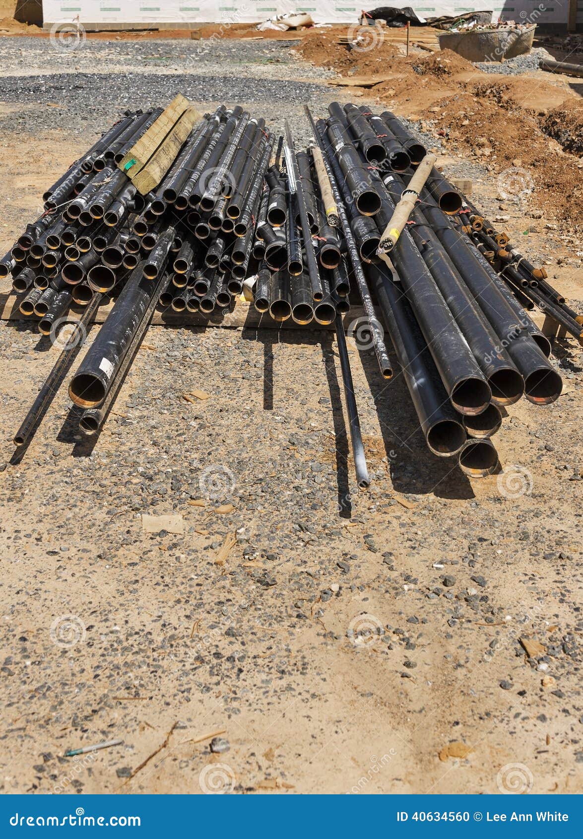 Stack of Pipes on Construction Site Stock Photo - Image of group, stack ...