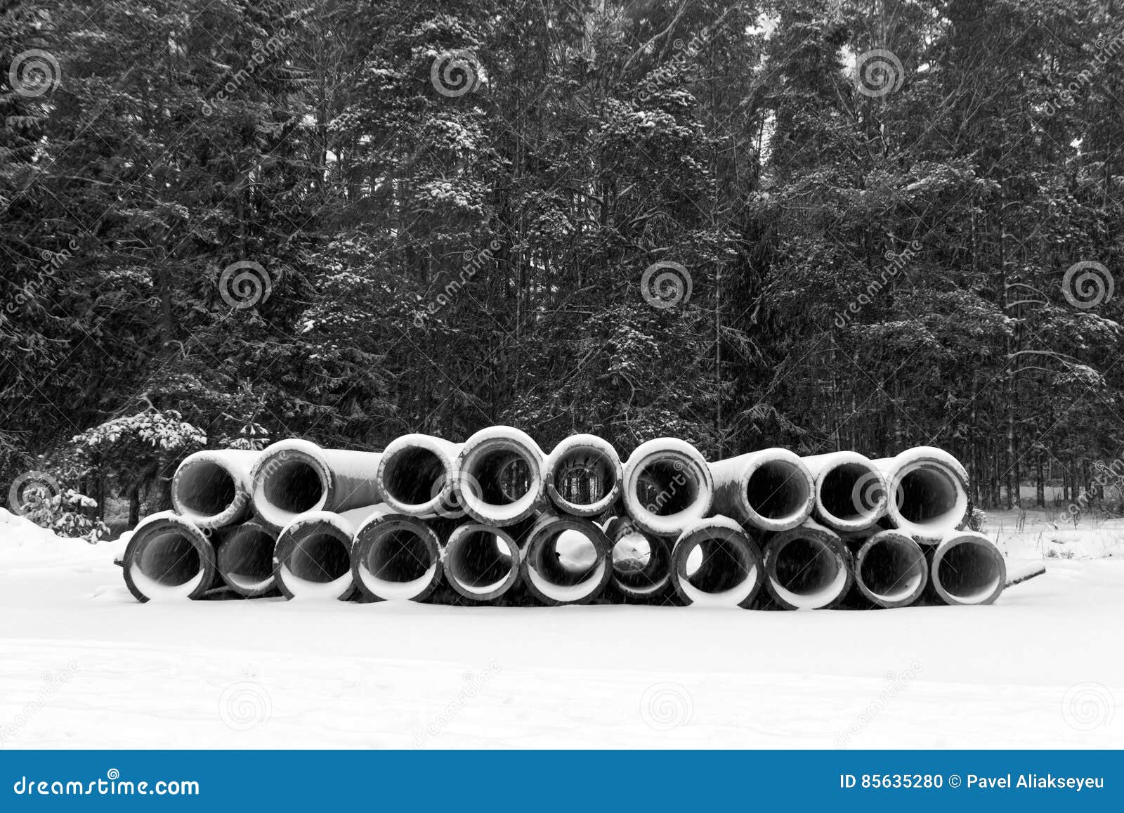 Stack of Pipes and Winter Forest. Stock Photo - Image of color ...