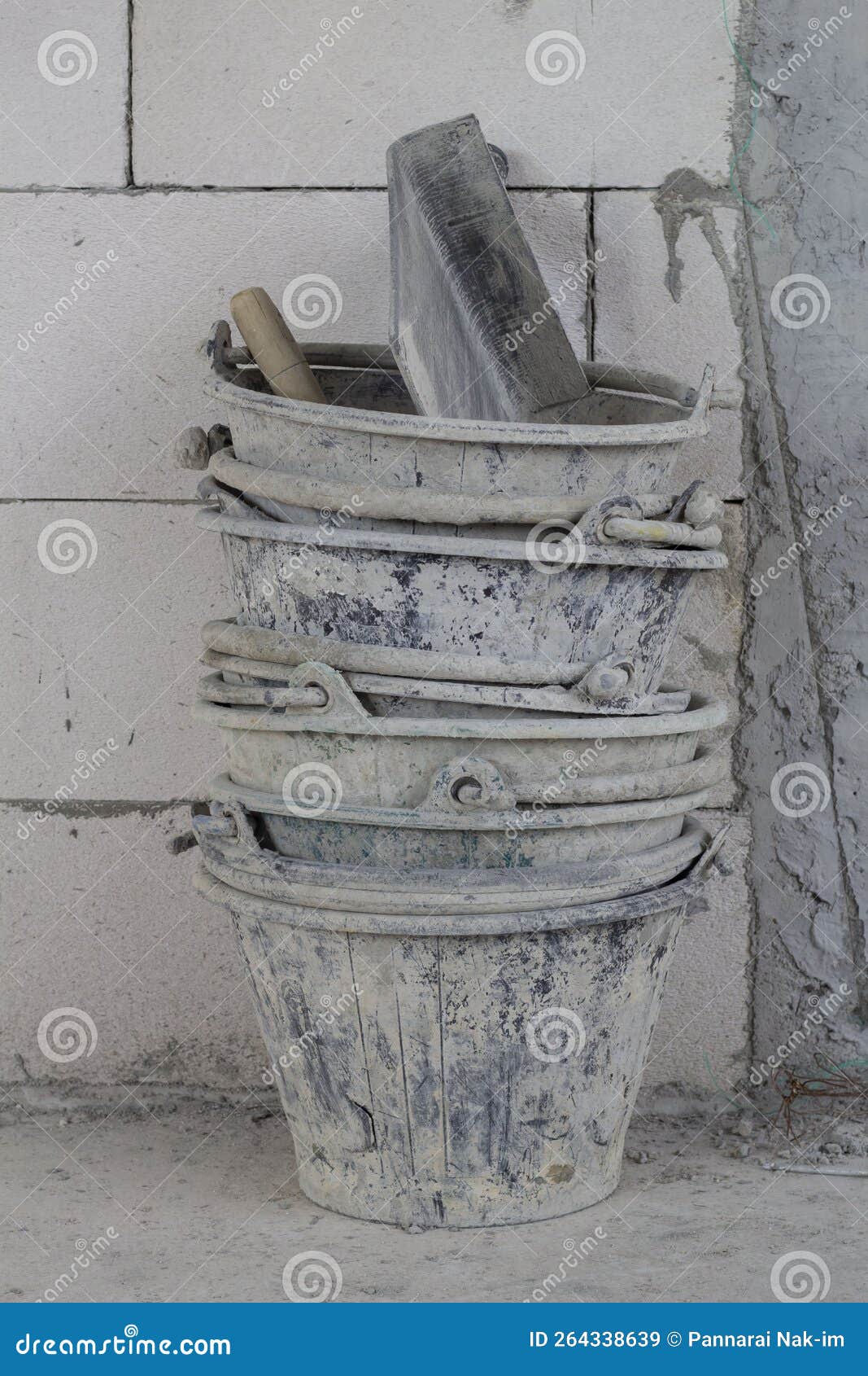 Stack of Plastic Pail with Inside the Plastering Trowel in the ...
