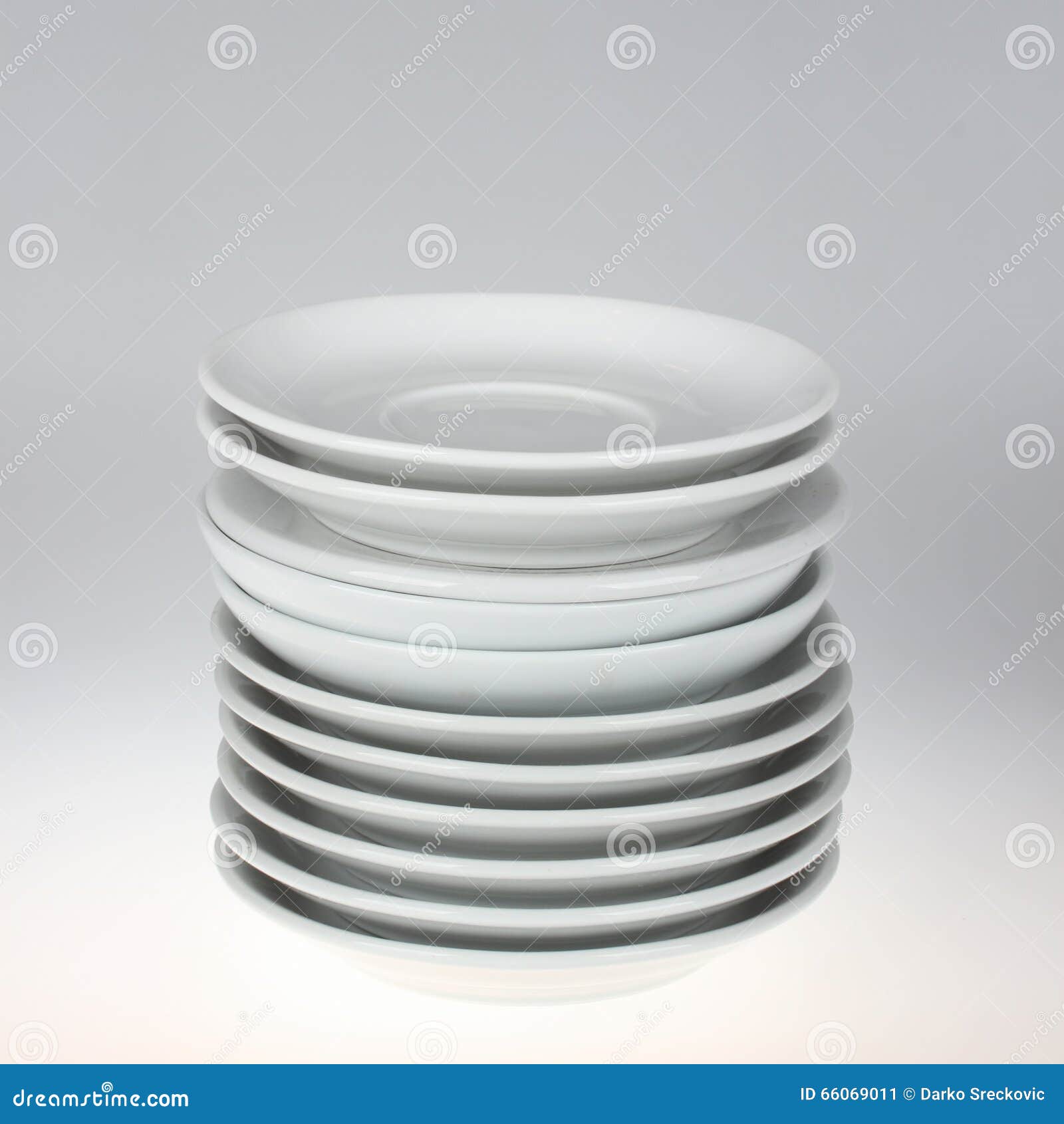 Stack of plates stock image. Image of pile, stacked, saucers - 66069011