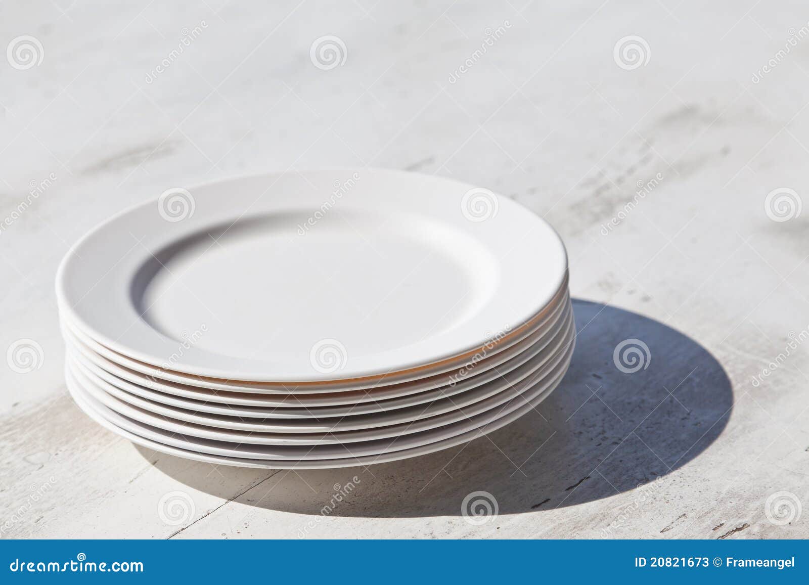 Stack of plates and shadow stock image. Image of china - 20821673