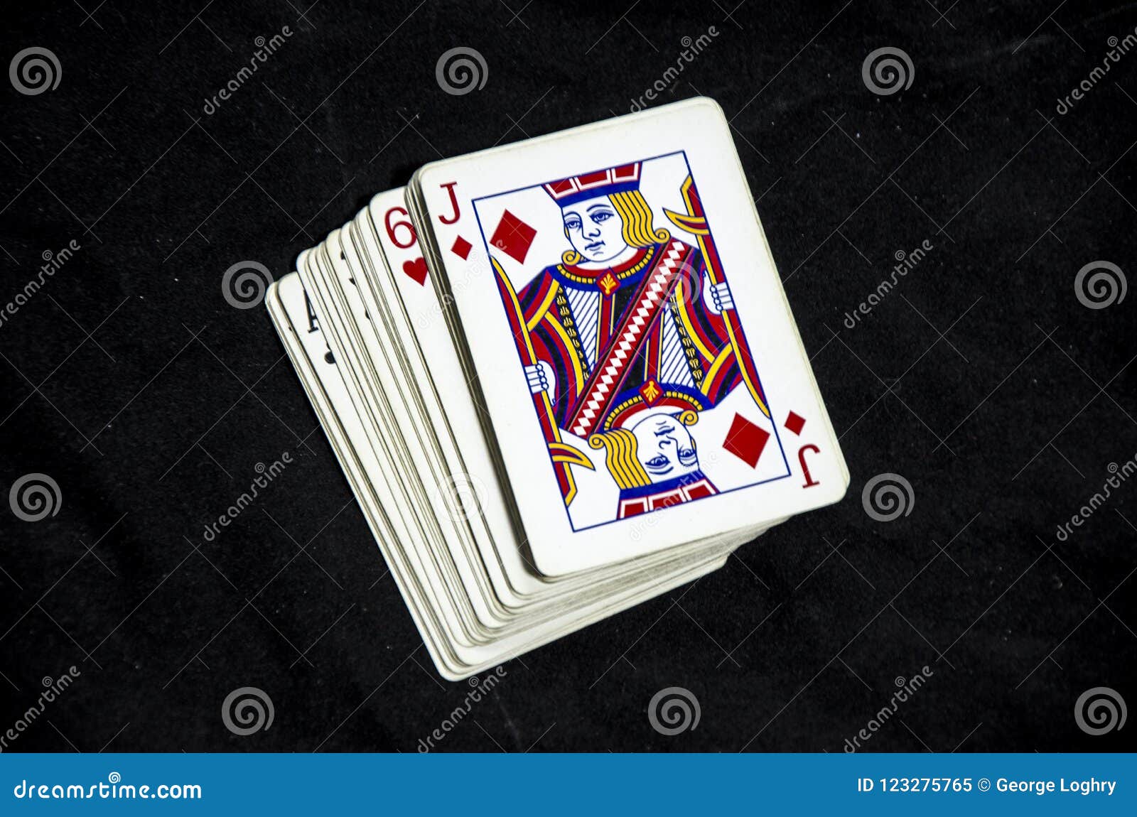A Stack of Playing Cards with a Jack Showing Stock Image - Image of ...