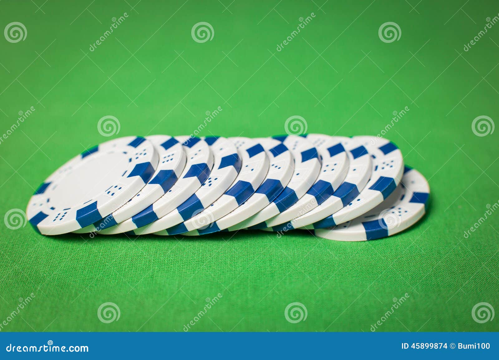 Stack of Poker Chips on a Green Table Stock Photo - Image of background ...