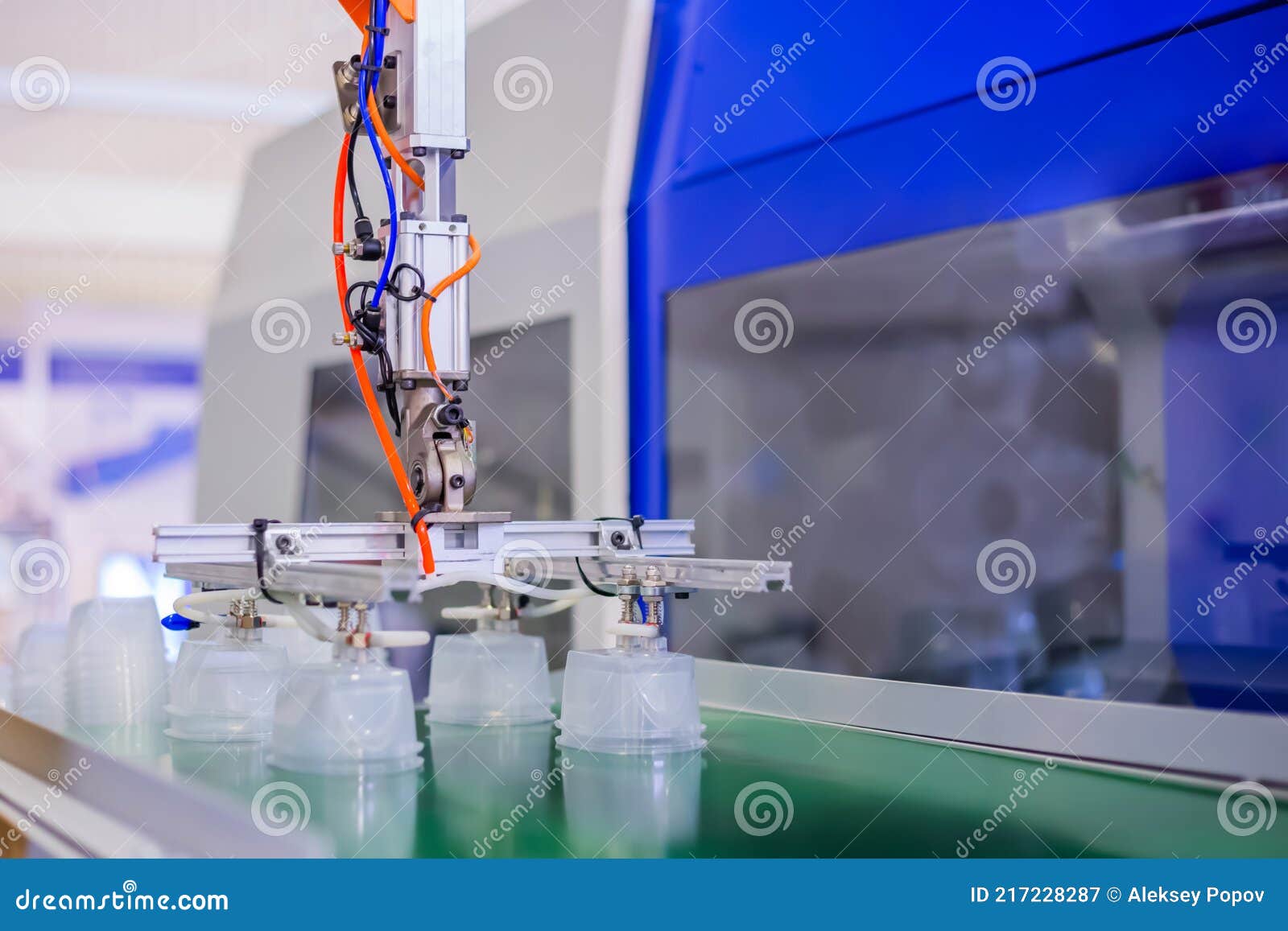 Stack of Food Containers on Conveyor Belt of Plastic Injection Molding ...