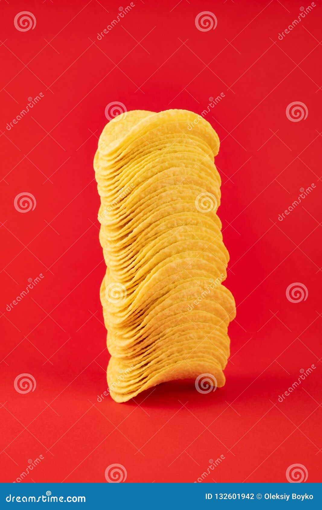Stack of Potato Chips in Bright Red Background. Minimalistic Image of ...
