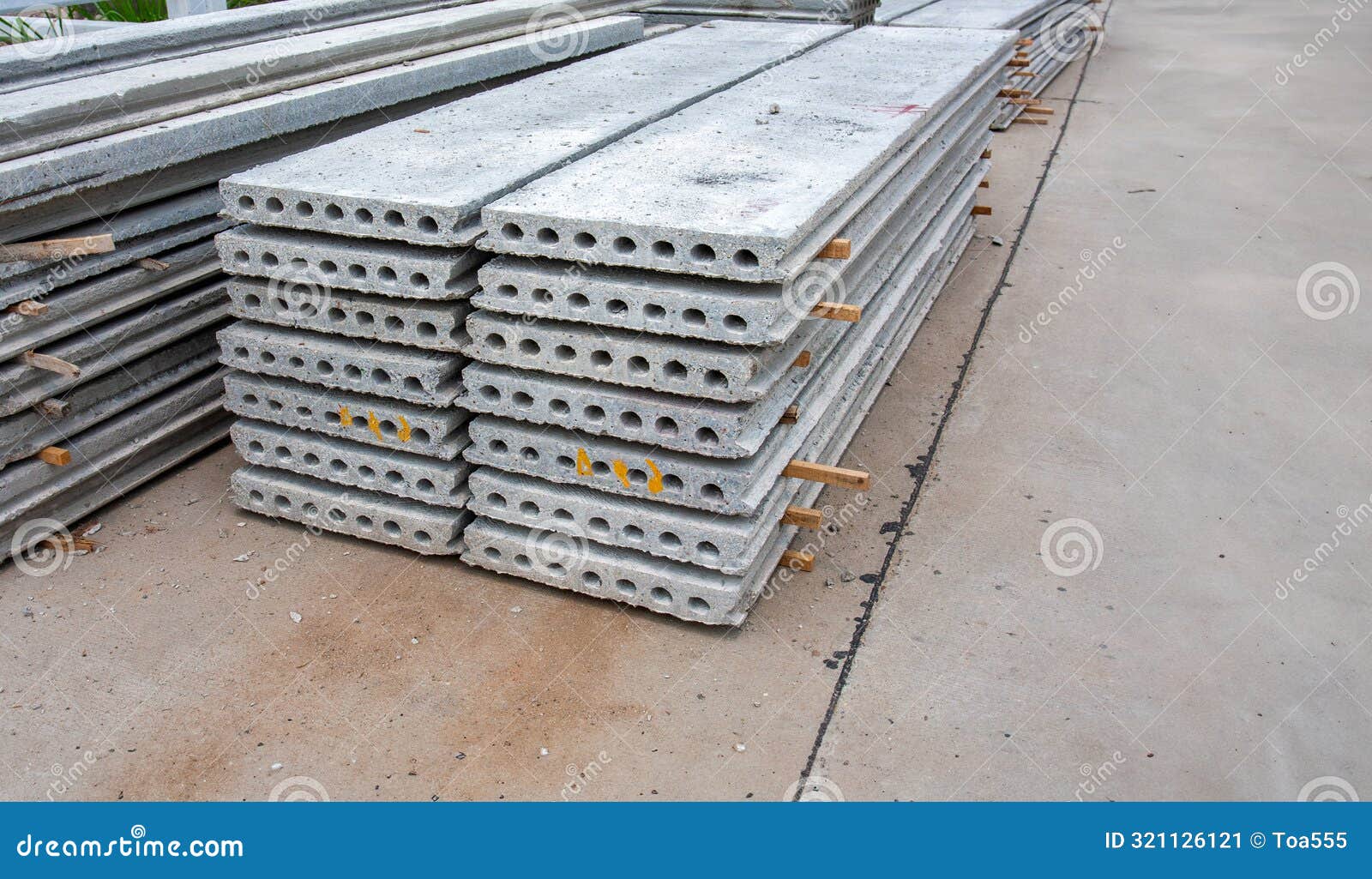 Stack of Precast Reinforced Concrete Slabs in House Construction Site ...
