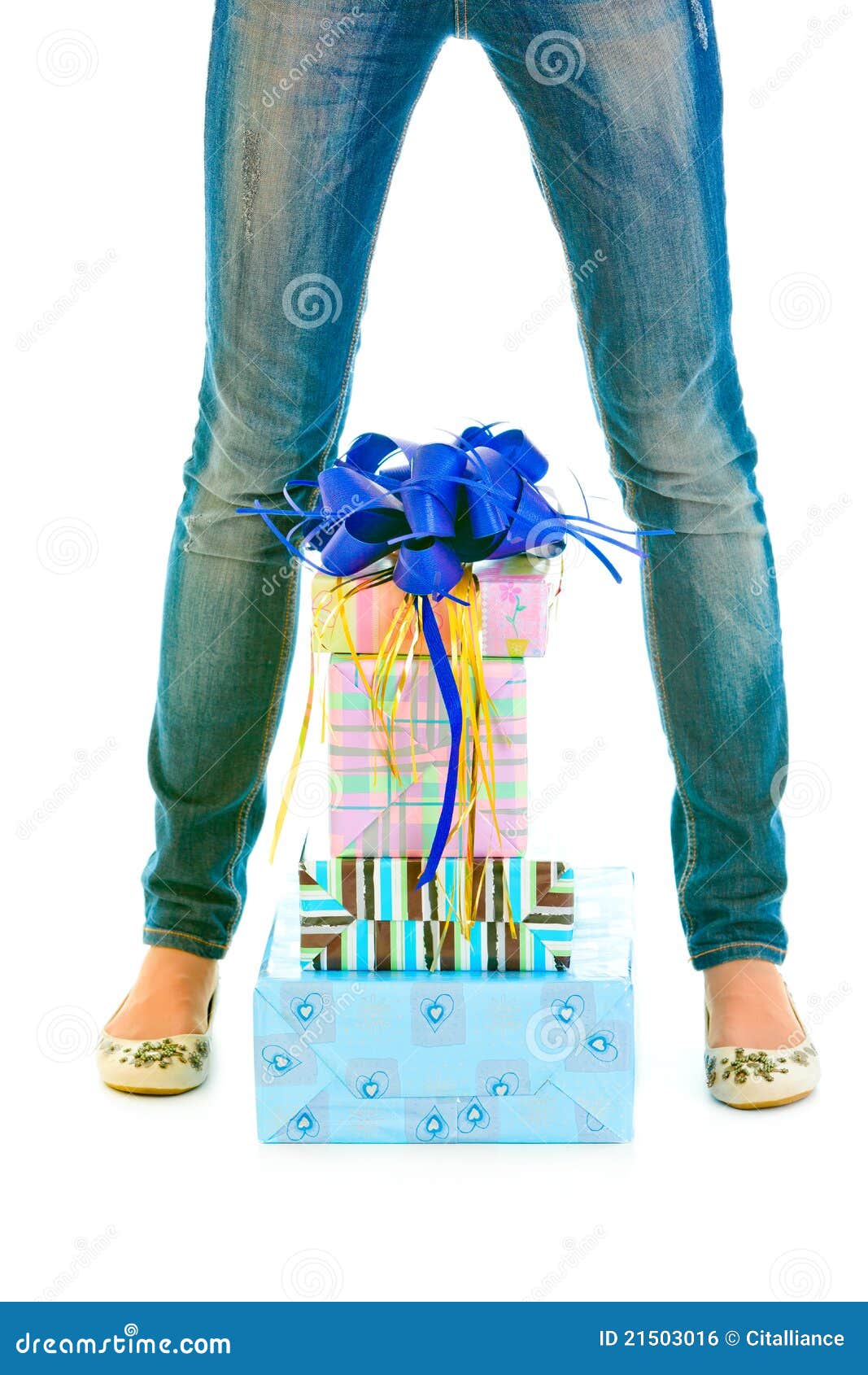 Stack of Present Boxes between the Legs Stock Photo - Image of presents ...