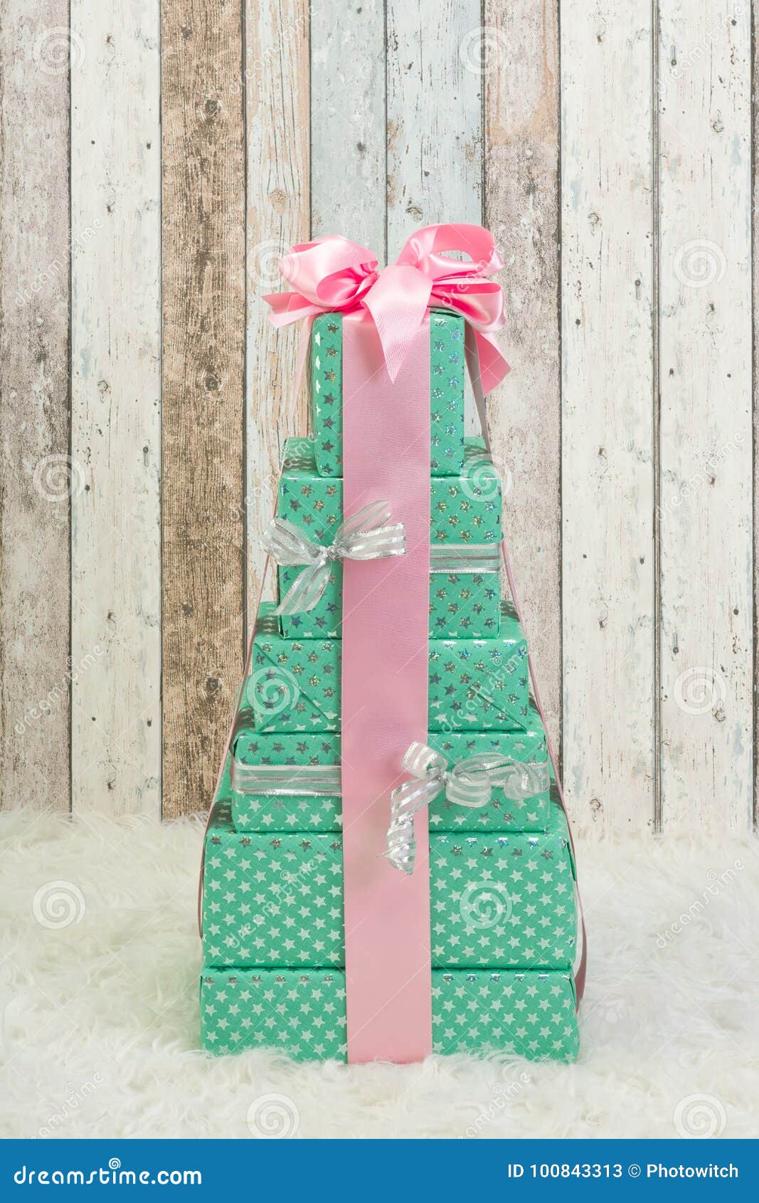 Stack of Presents in Pastel Colors Stock Image - Image of wall, ribbons ...