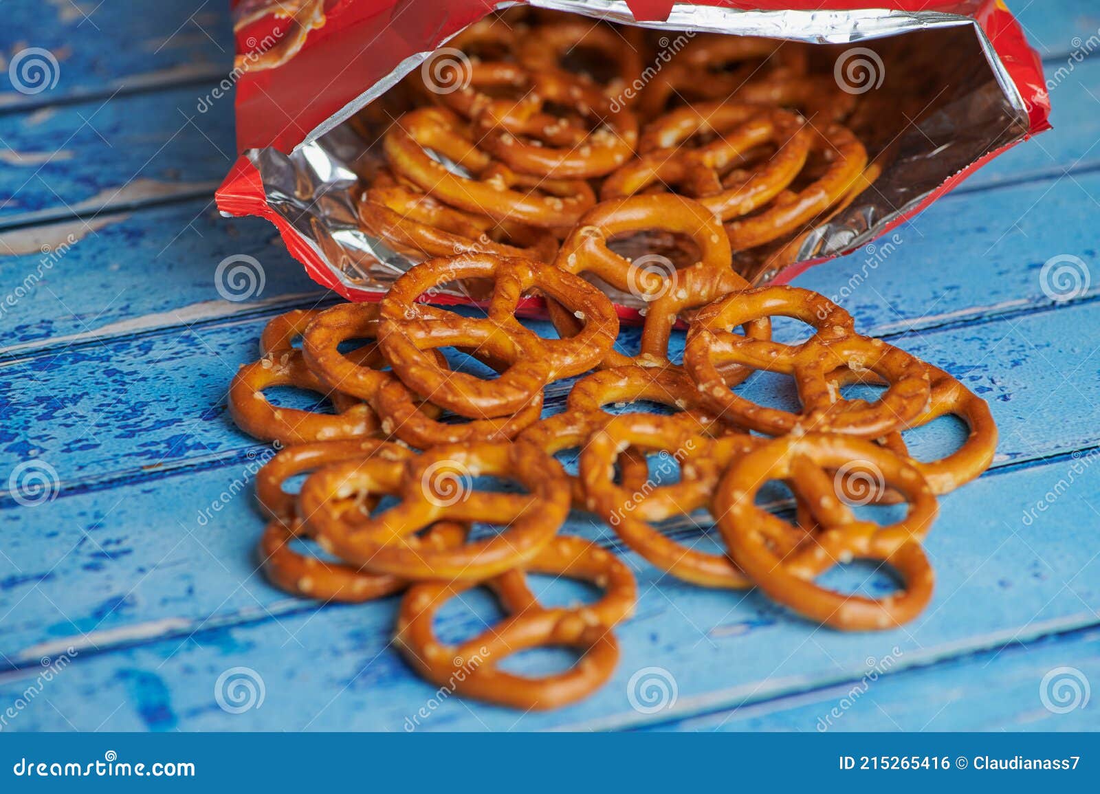 Stack of Pretzels on Blue Background Stock Photo - Image of tasty ...