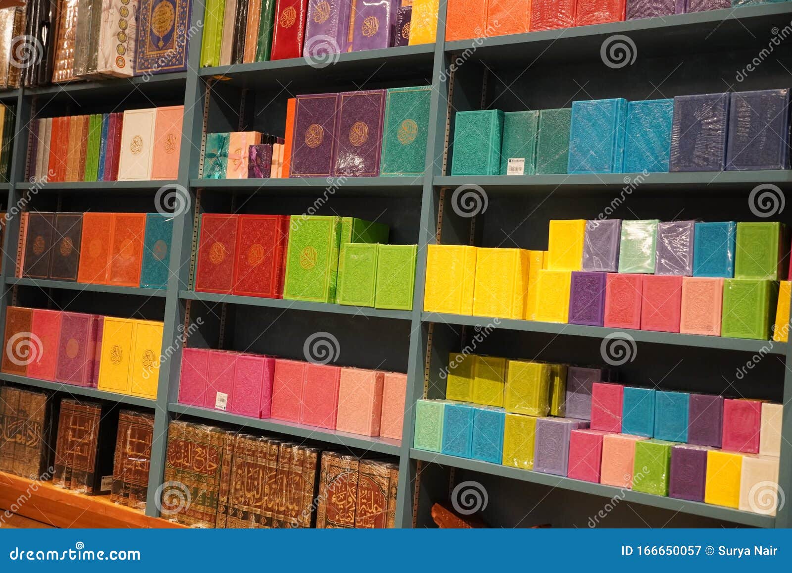 Stack of Quran on the Shelf. Quran Religious Book Stacked in Shelf for ...