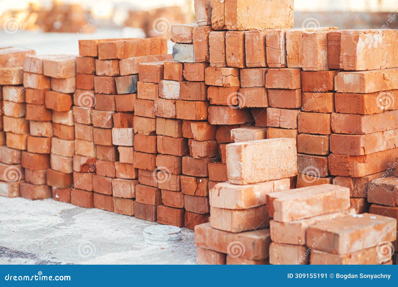 Stack of Red Bricks on Concrete Foundation, Process of House Building ...