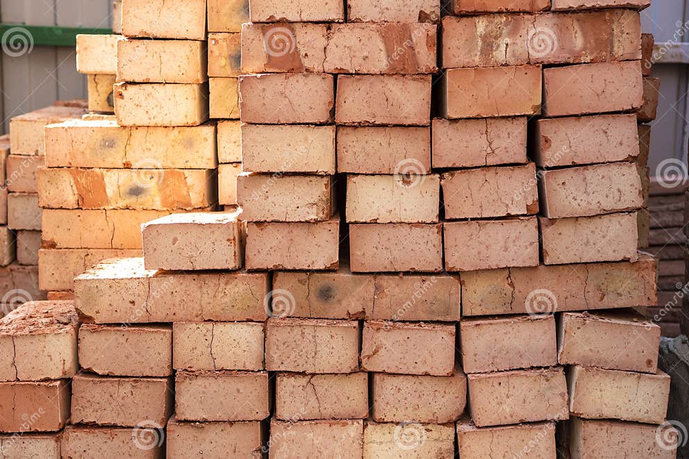 Stack of Red Bricks on Concrete Foundation, Process of House Building ...