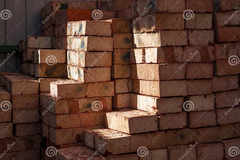 Stack of Red Bricks on Concrete Foundation, Process of House Building ...