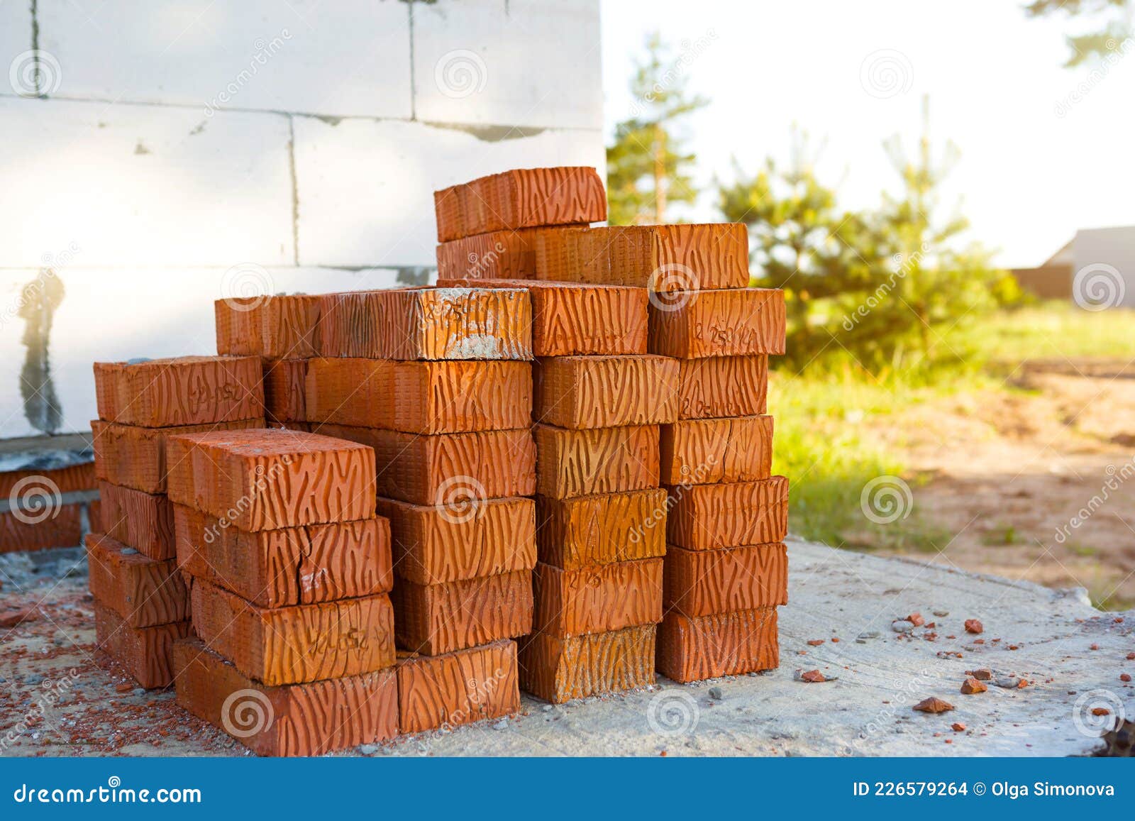 A Stack of Red Bricks at a Construction Site. Construction Materials ...