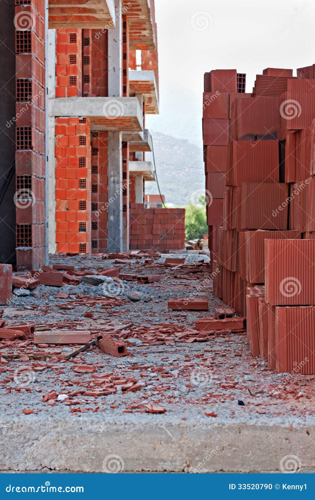 Stack of Red Building Blocks on Messy Site Stock Photo - Image of ...