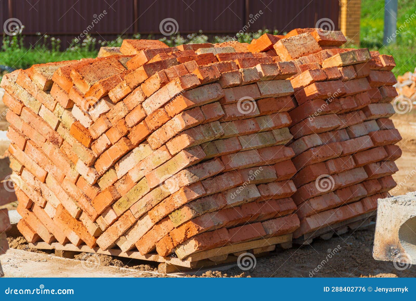 Stack of Red Clay Brick on Construction Site. Bricks Pallet. Red Brick ...