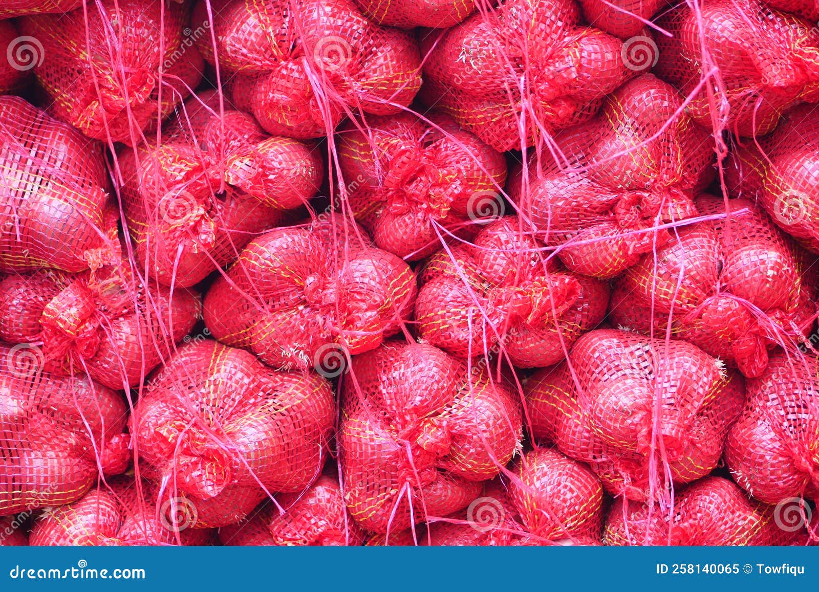 Stack of red onion in bags stock image. Image of ripe - 258140065