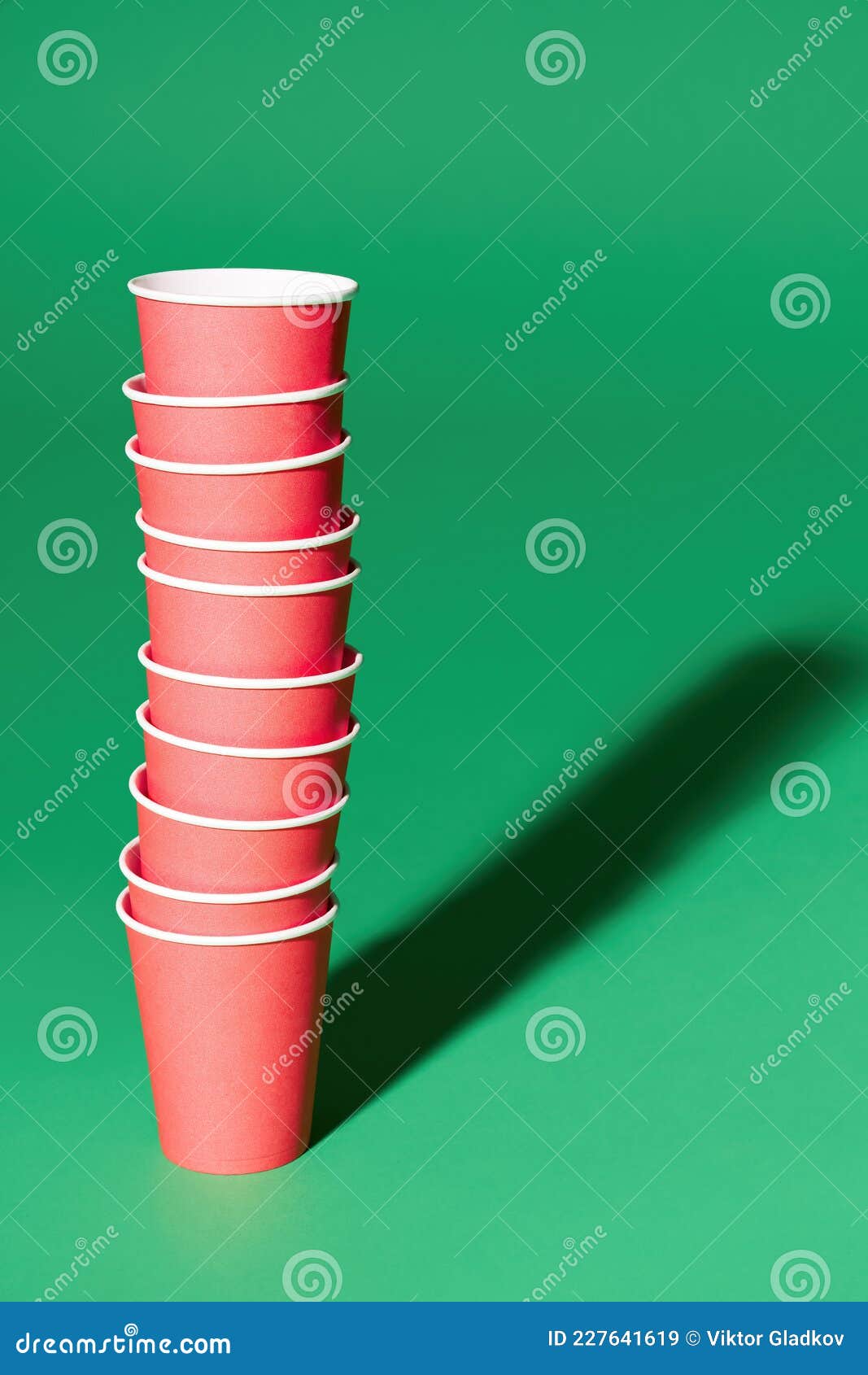 Stack of Red Paper Cup on Green Background Stock Image - Image of ...