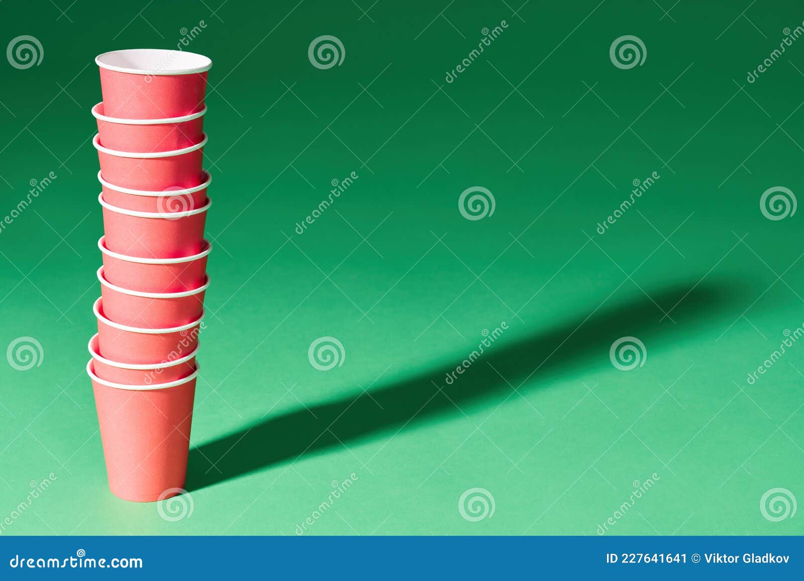 Stack of Red Paper Cup on Green Background Stock Image - Image of green ...