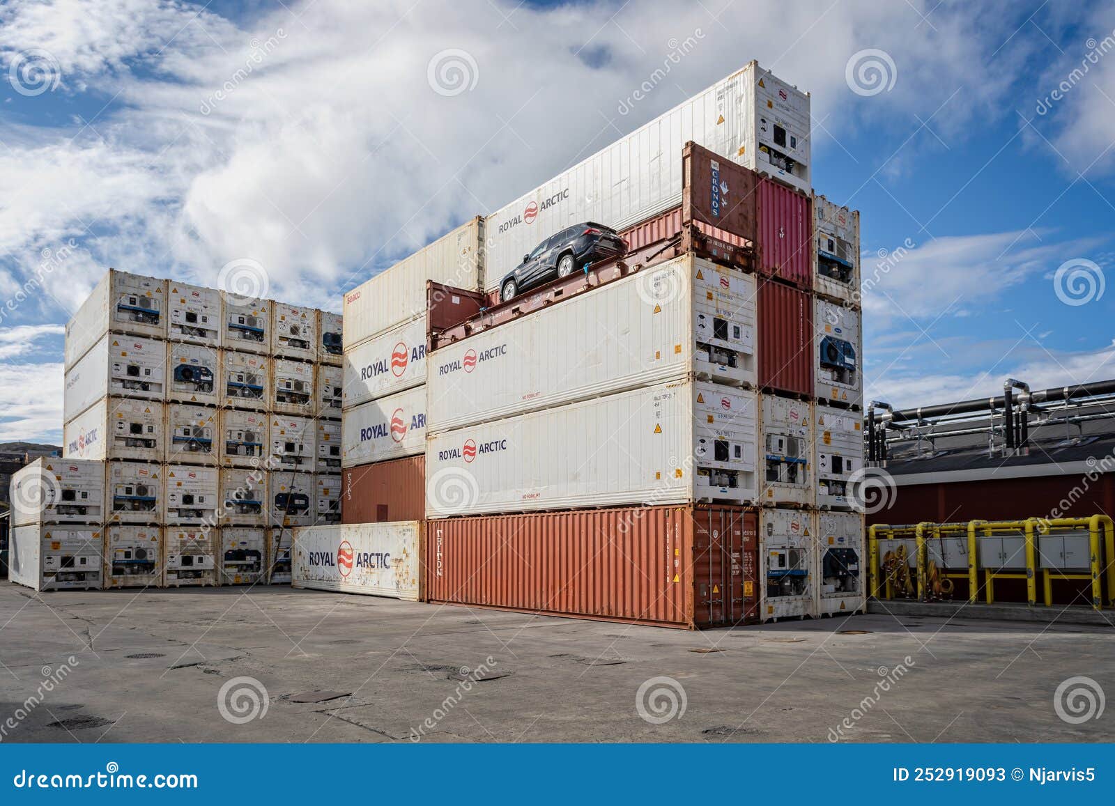 Stack Of Red And White Containers With Black Car On Open Container On ...