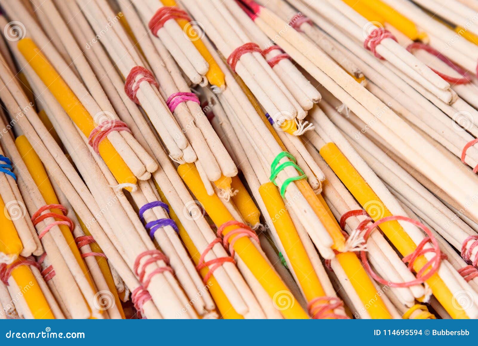 Stack of Red and Yellow Incense Sticks in a Buddhist Temple.Thai Stock ...