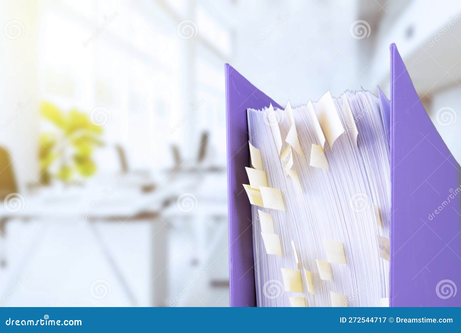 Stack of Reporting Paper Documents in a Purple Folder with Bookmarks on ...