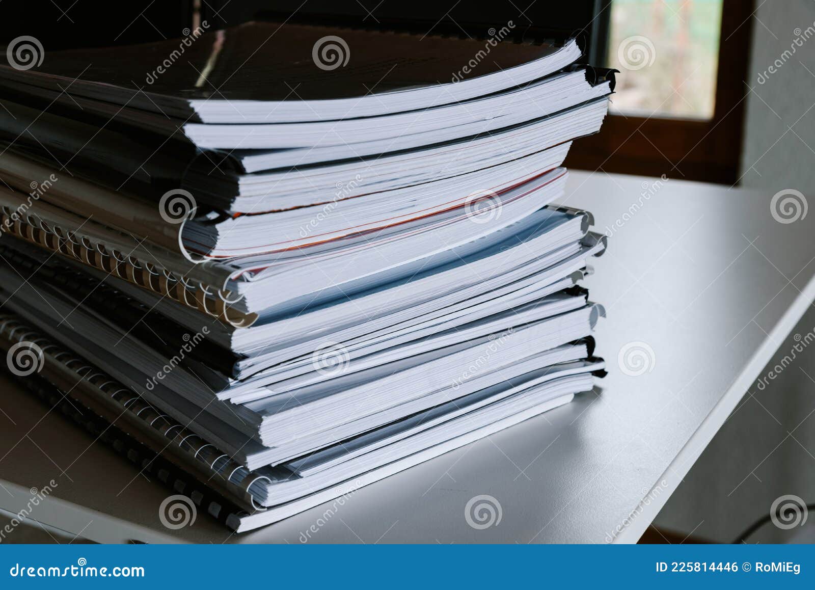 Stack of Reports Lies on a Desk Ready for Review Stock Photo - Image of ...