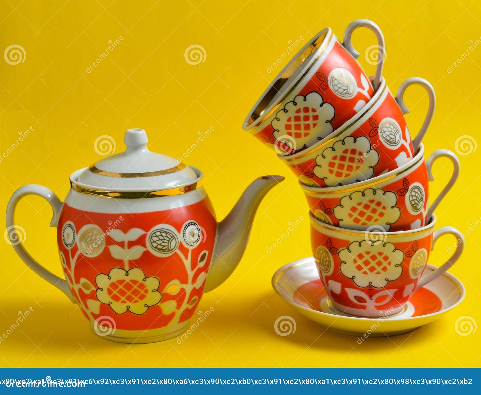 Stack of Retro Cups and Teapot on a Yellow Background Stock Image ...