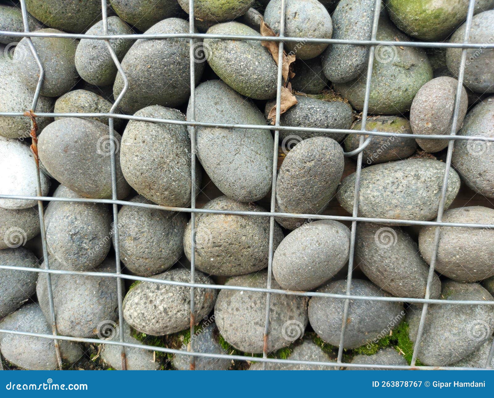 Stack of Rocks Behind the Cage Stock Image - Image of cage, gravel ...