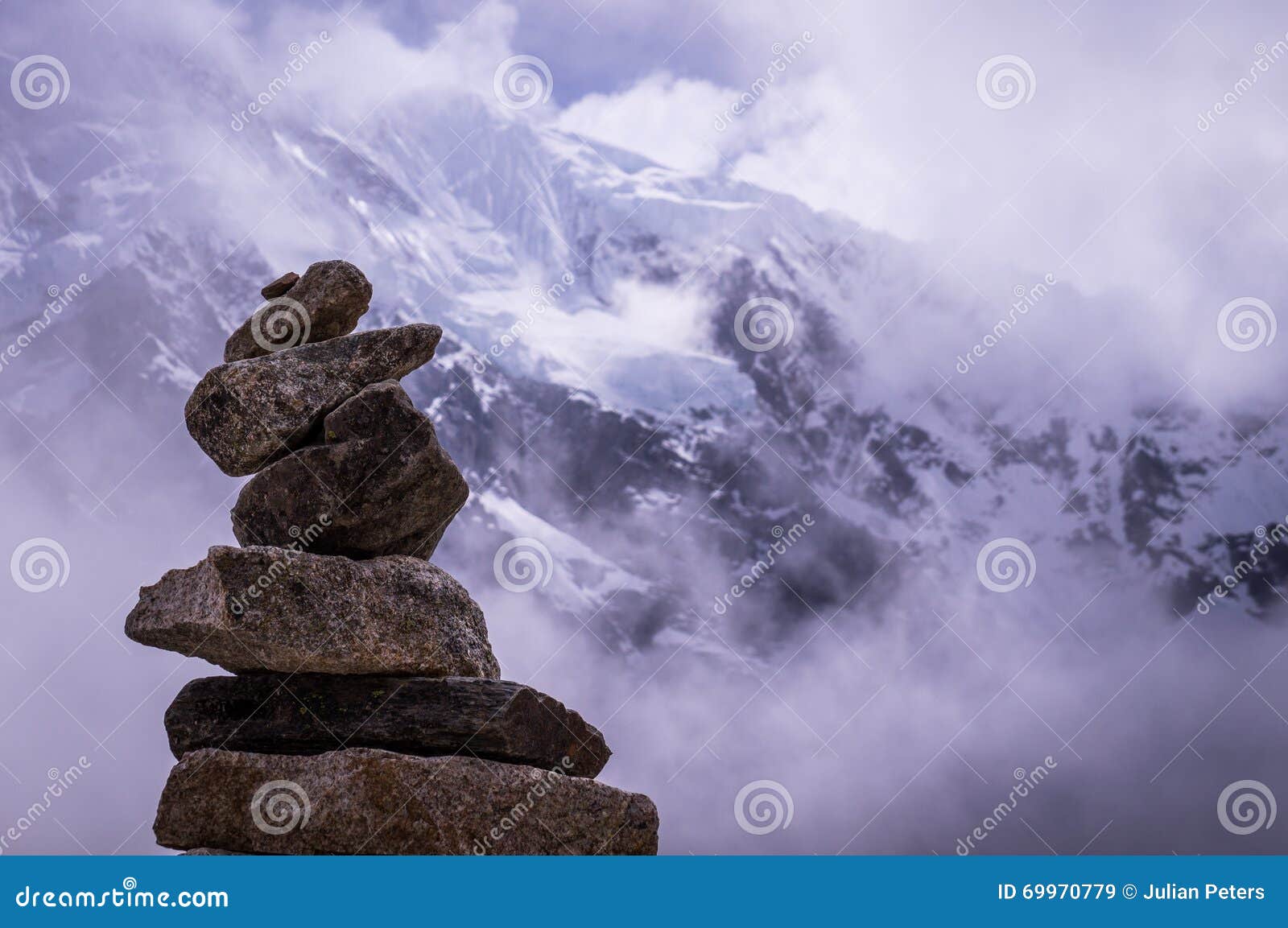 Stack of Rocks in Front of Alpine Background Stock Image - Image of ...
