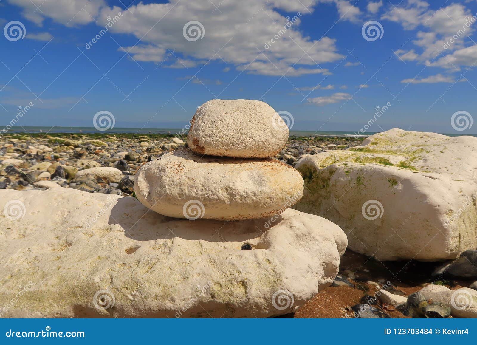 A Stack of Rocks on a Pebbled Beach Stock Photo - Image of pile ...