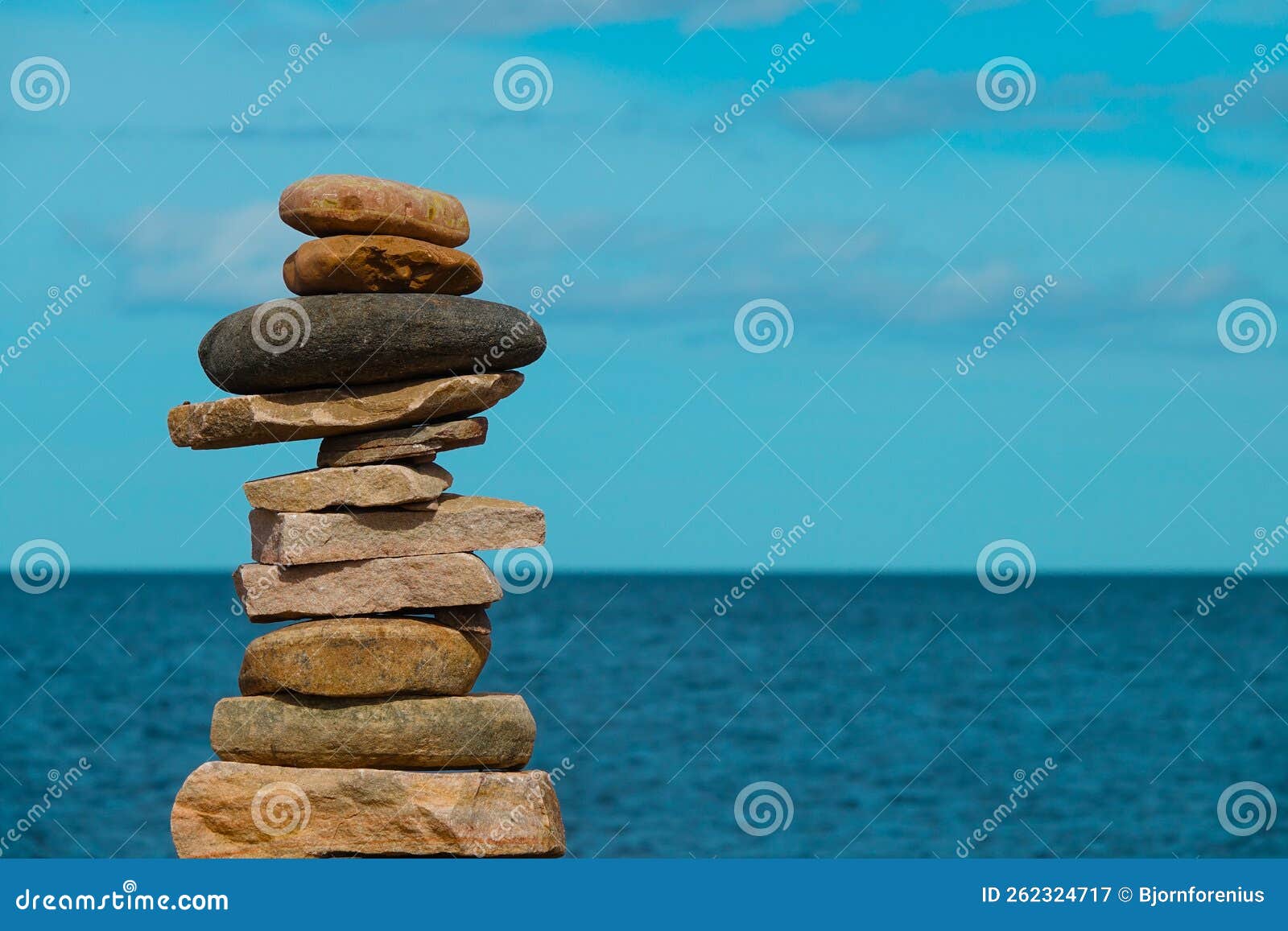 Stack of Rocks. Stone Tower with Ocean Blur in Background Stock Image ...