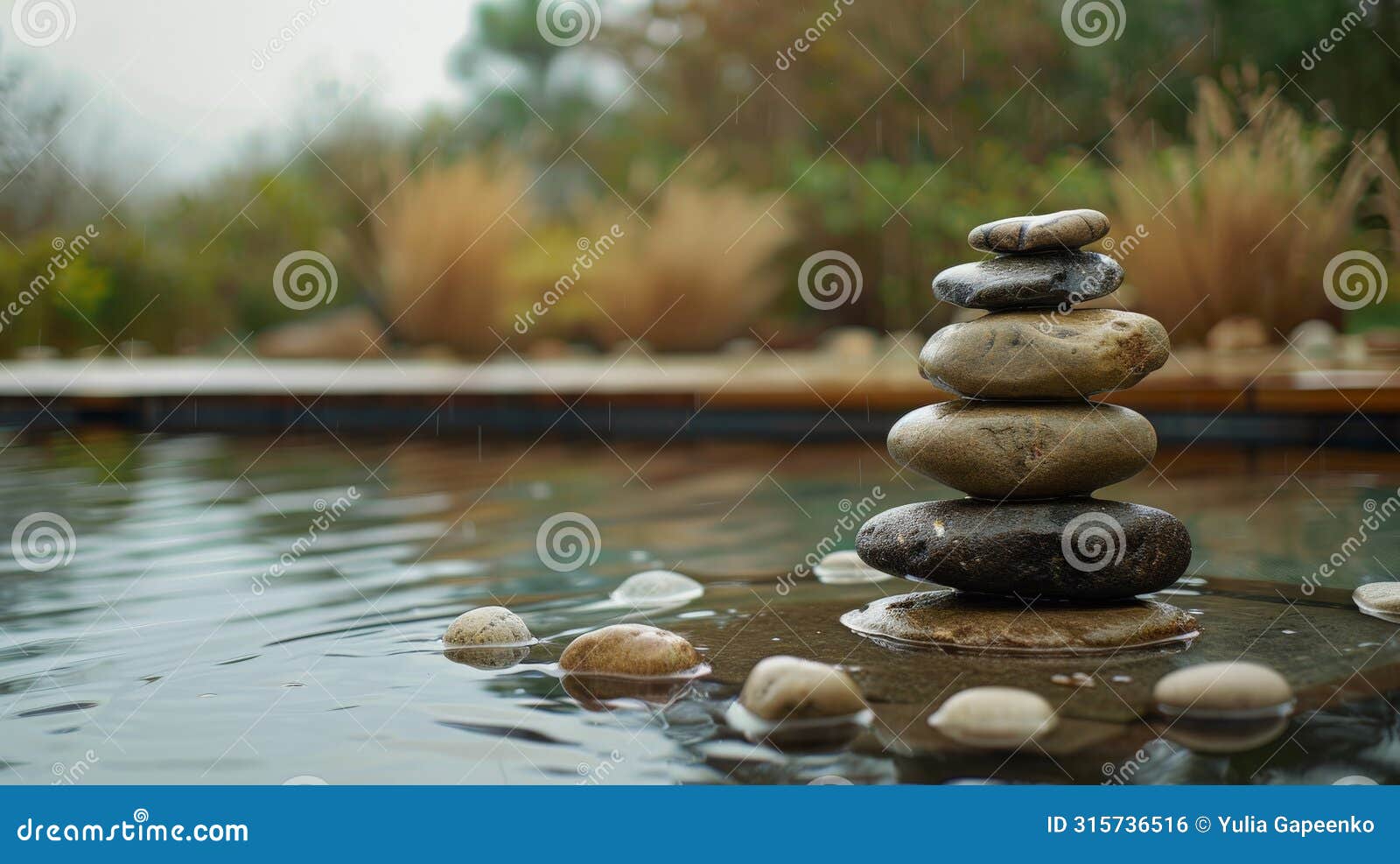Stack of Rocks on Wooden Dock Stock Photo - Image of structure, shore ...