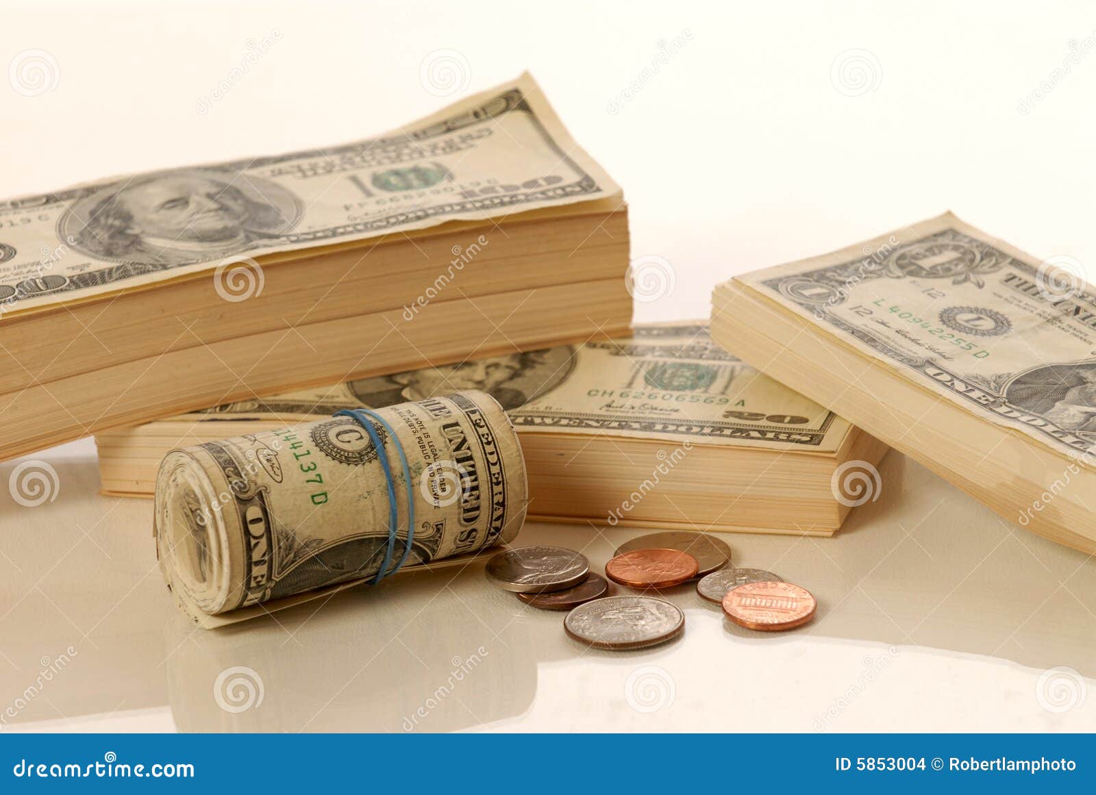Stack and Roll of Paper Money Stock Photo - Image of bills, retire: 5853004
