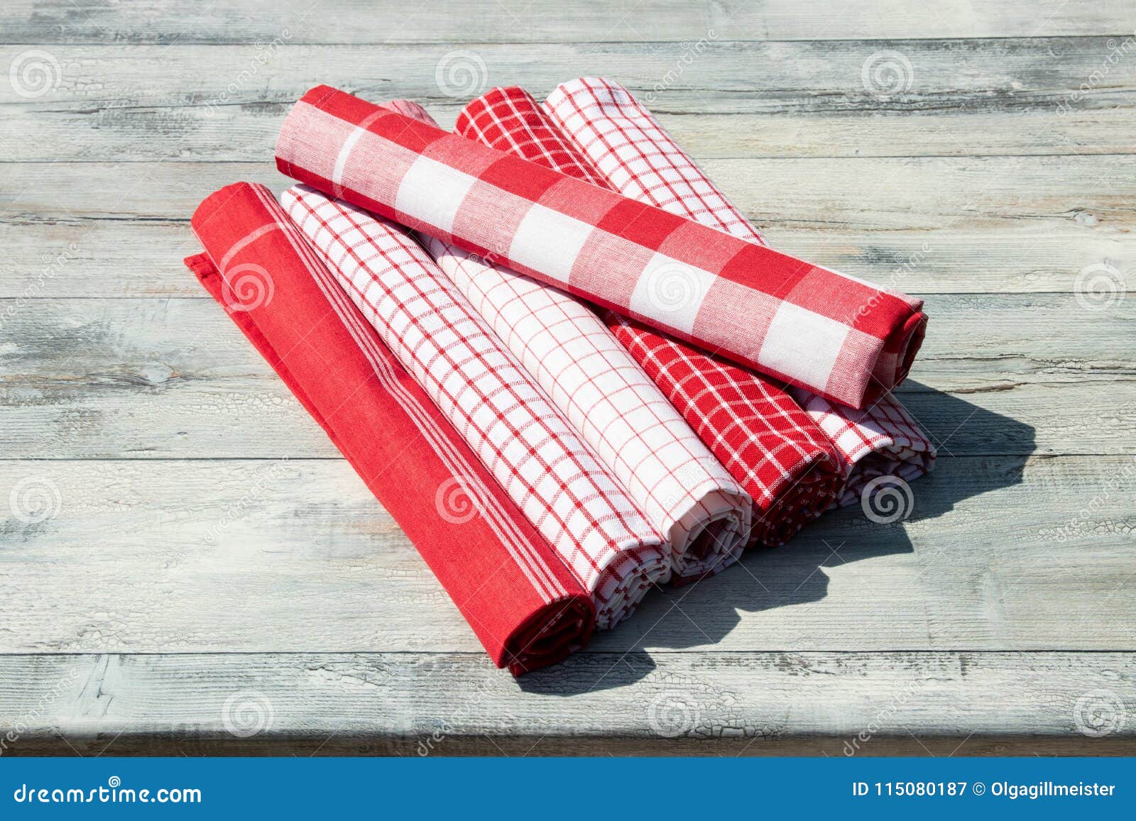 Stack of Rolled Up Red White Checkered and Striped Linen Tableclothes ...