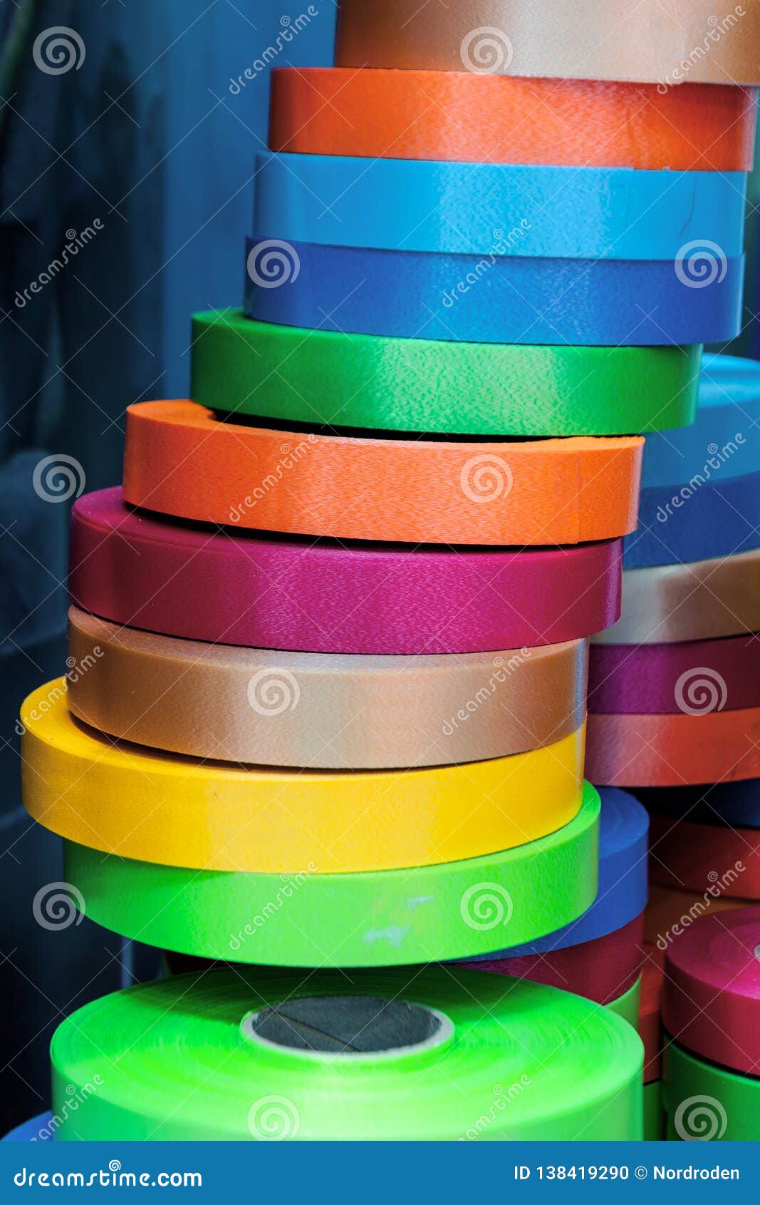 A Stack of Rolls of Multi-colored Ribbon Stock Photo - Image of swirl ...