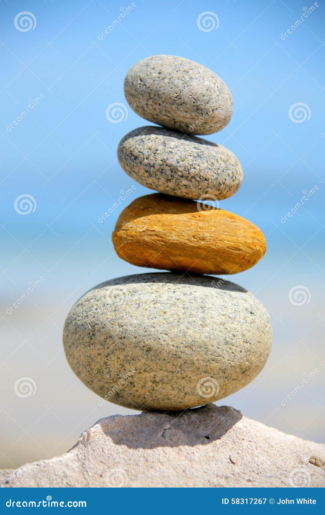 A Stack of Round Rocks by the Sea Stock Image - Image of round, stress ...