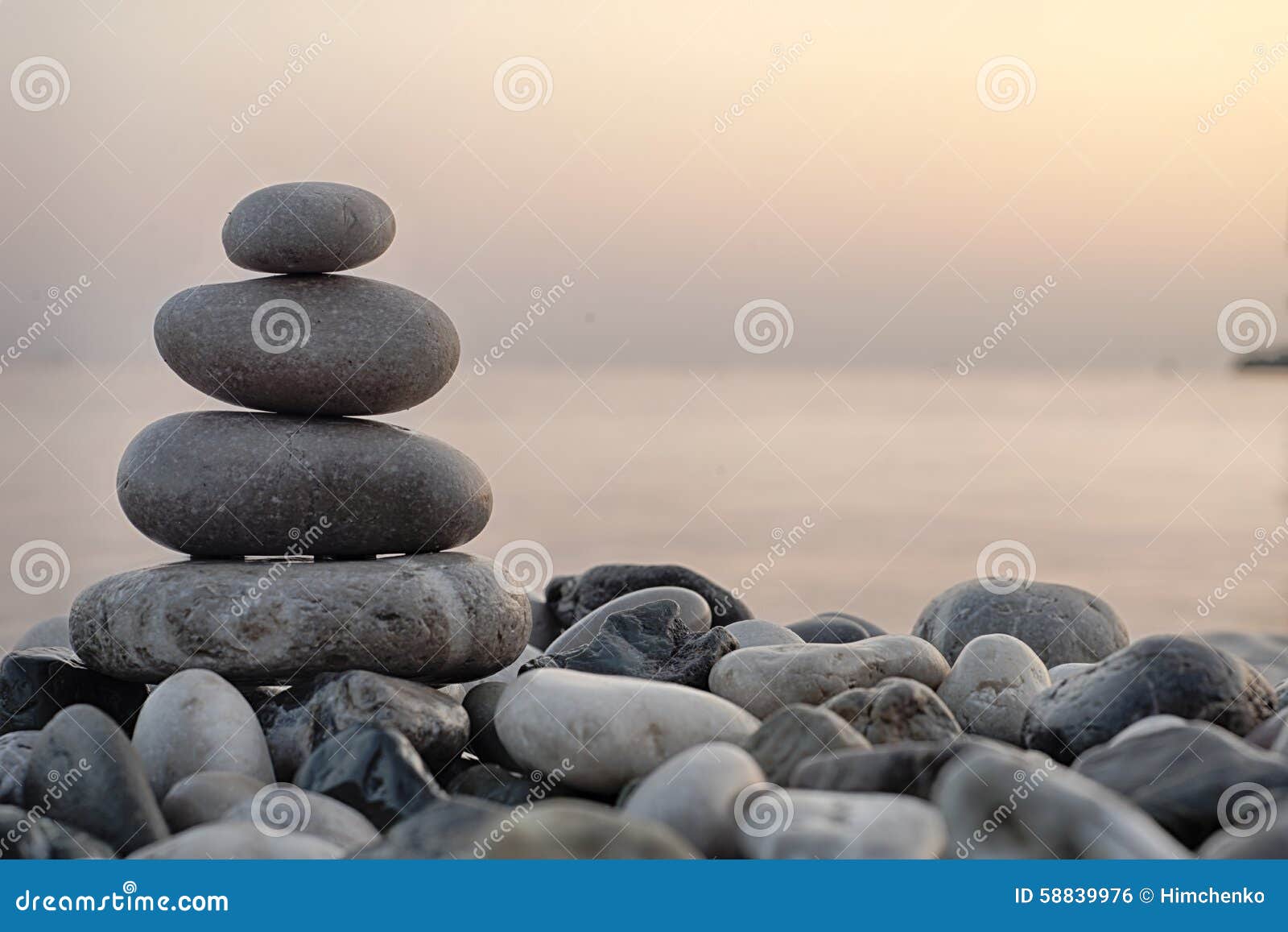 Stack of Round Smooth Stones on a Seashore Stock Photo - Image of heap ...