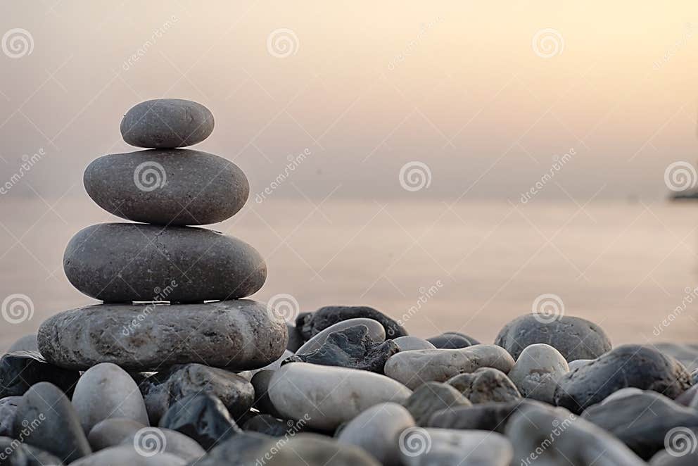 Stack of Round Smooth Stones on a Seashore Stock Photo - Image of heap ...