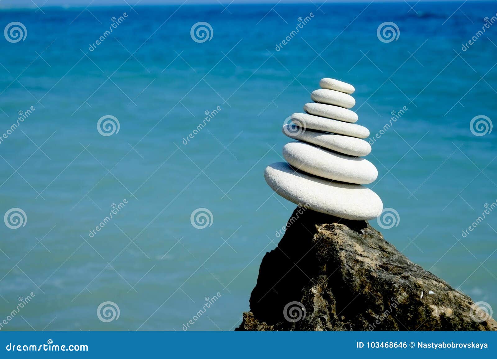 Stack of Round Smooth Stones on a Seashore. Balance Peace Silence ...