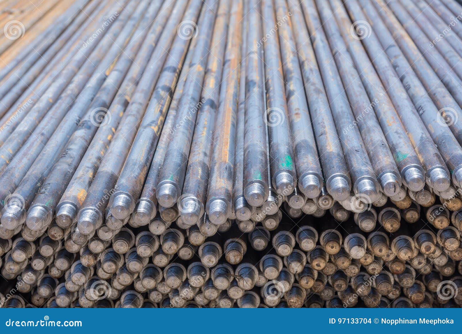 Stack of round steel bar stock photo. Image of jack, industry - 97133704