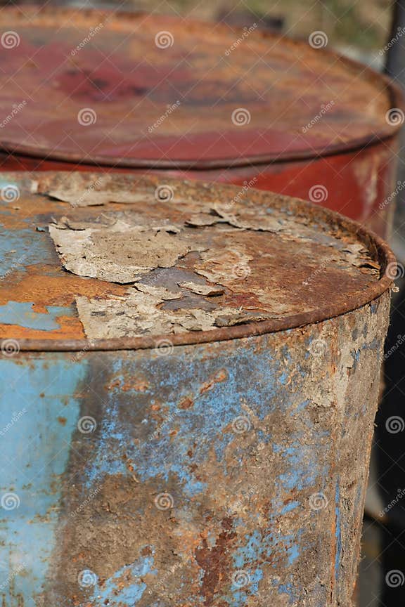 Stack of rusting barrels stock image. Image of containers - 8805599