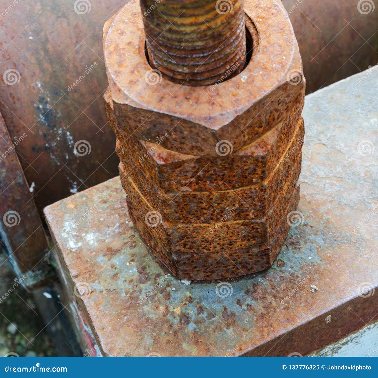 Stack of Rusting Nuts on a Bolt Stock Image - Image of bolt, misaligned ...