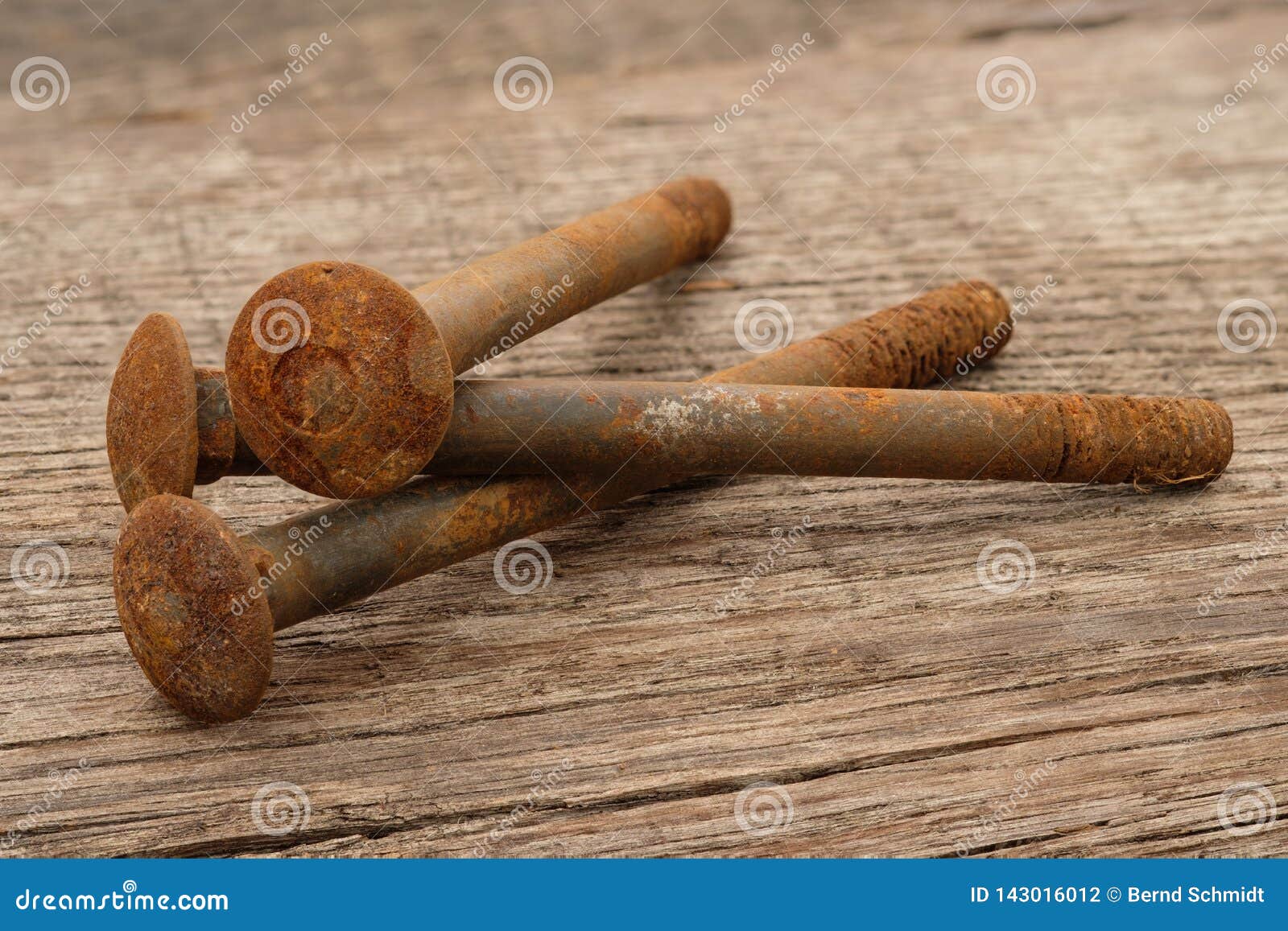 Stack Rusty Metal Screws on Rustic Wood Stock Photo - Image of ...