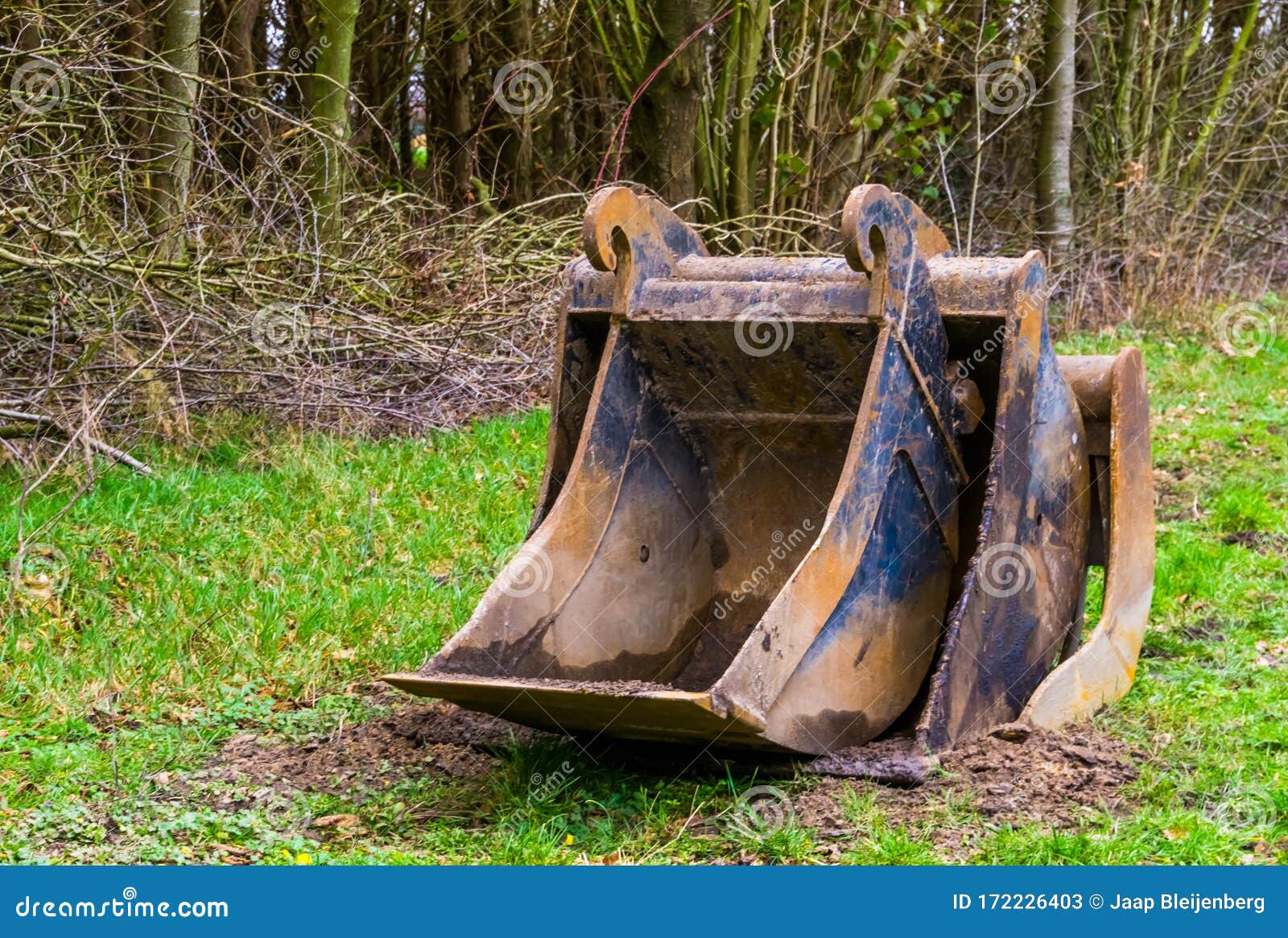 Excavator During Earthmoving Work At Construction Site On Sunset ...