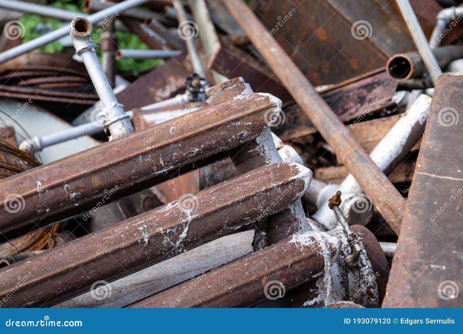 Stack of Scrap Metal, Cast Iron Radiator in Front. Recycling and ...