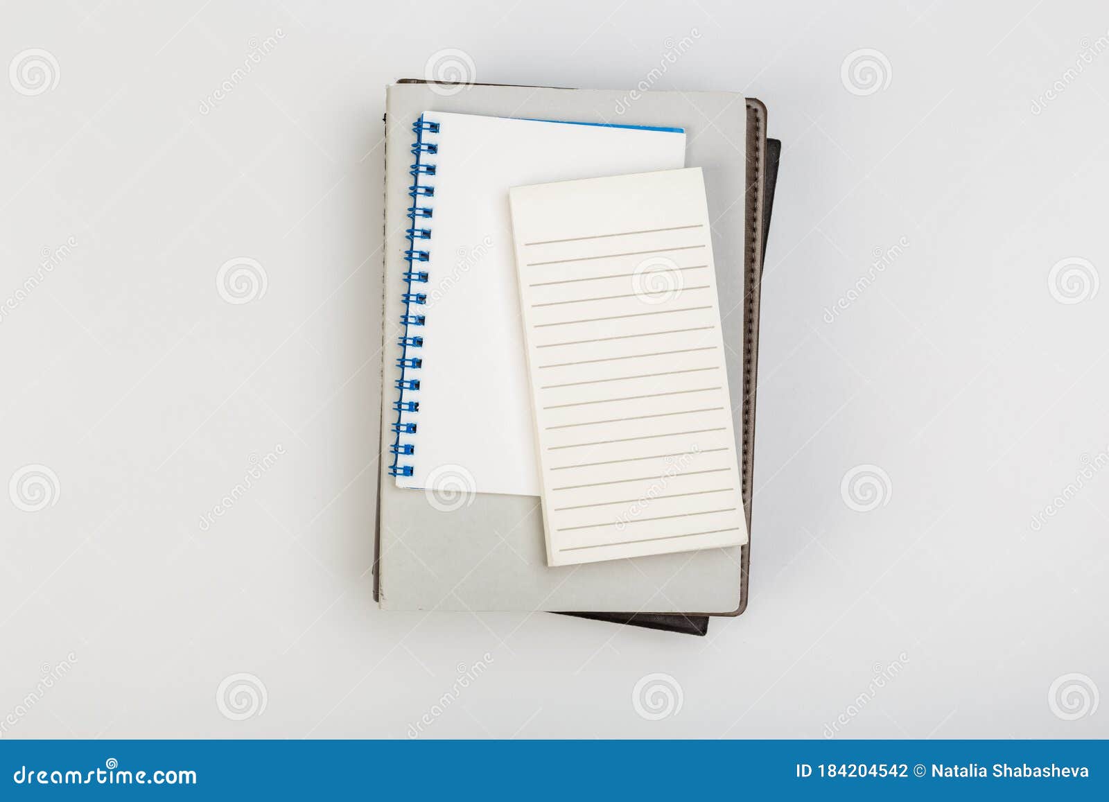 Stack of Colorful Notebooks with Pen Isolated on White Background Stock ...