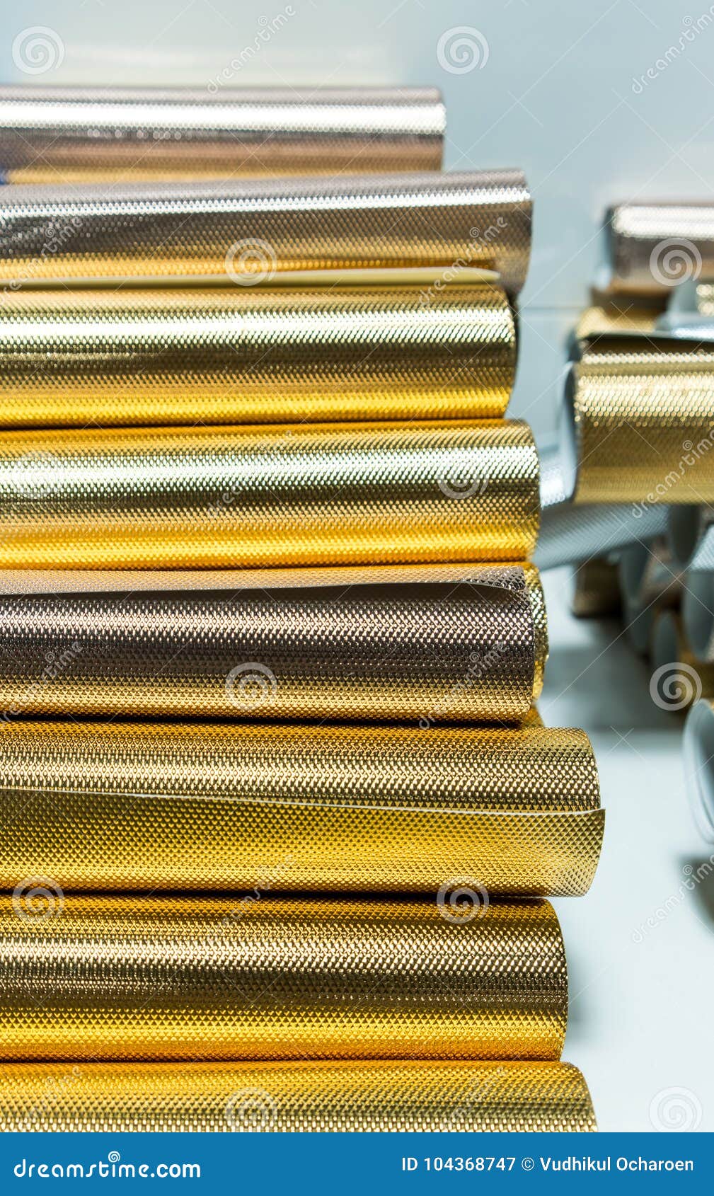 Stack of Shiny Golden Gift-wrapping Paper Rolls for Texture Stock Image ...